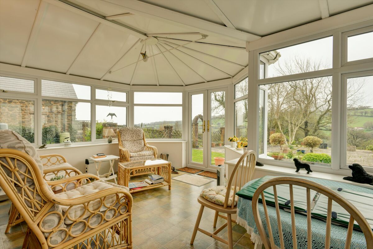 A south-facing, period four bedroom barn conversion set in a rural ...