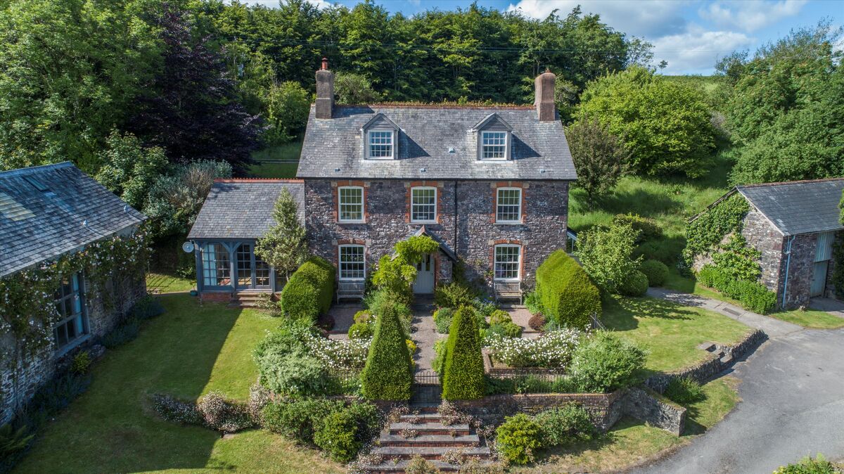 A beautiful family home, with a separate three bedroom cottage, several ...