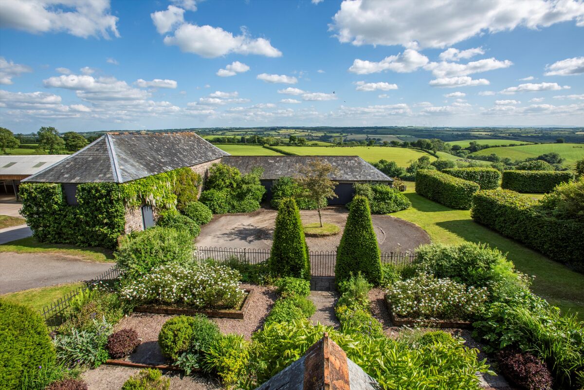 A beautiful family home, with a separate three bedroom cottage, several ...