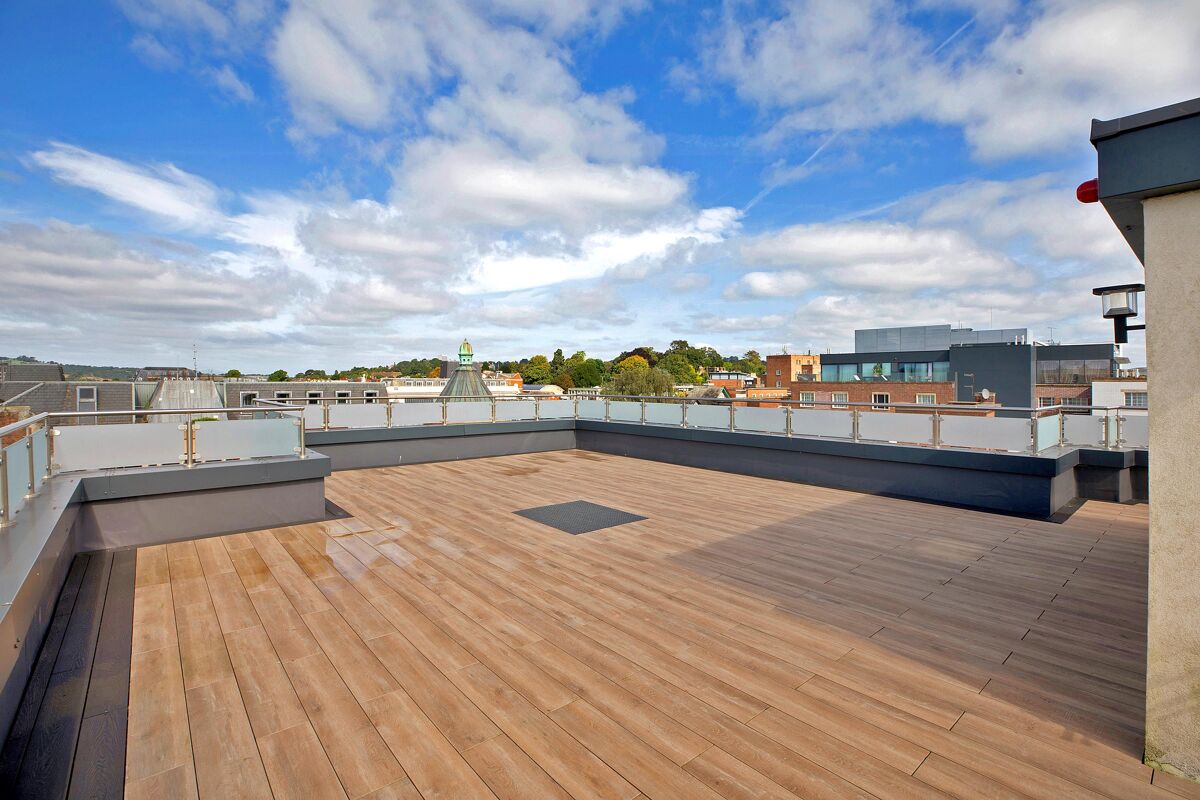 A stunning two-bedroom apartment with a roof terrace and views of ...