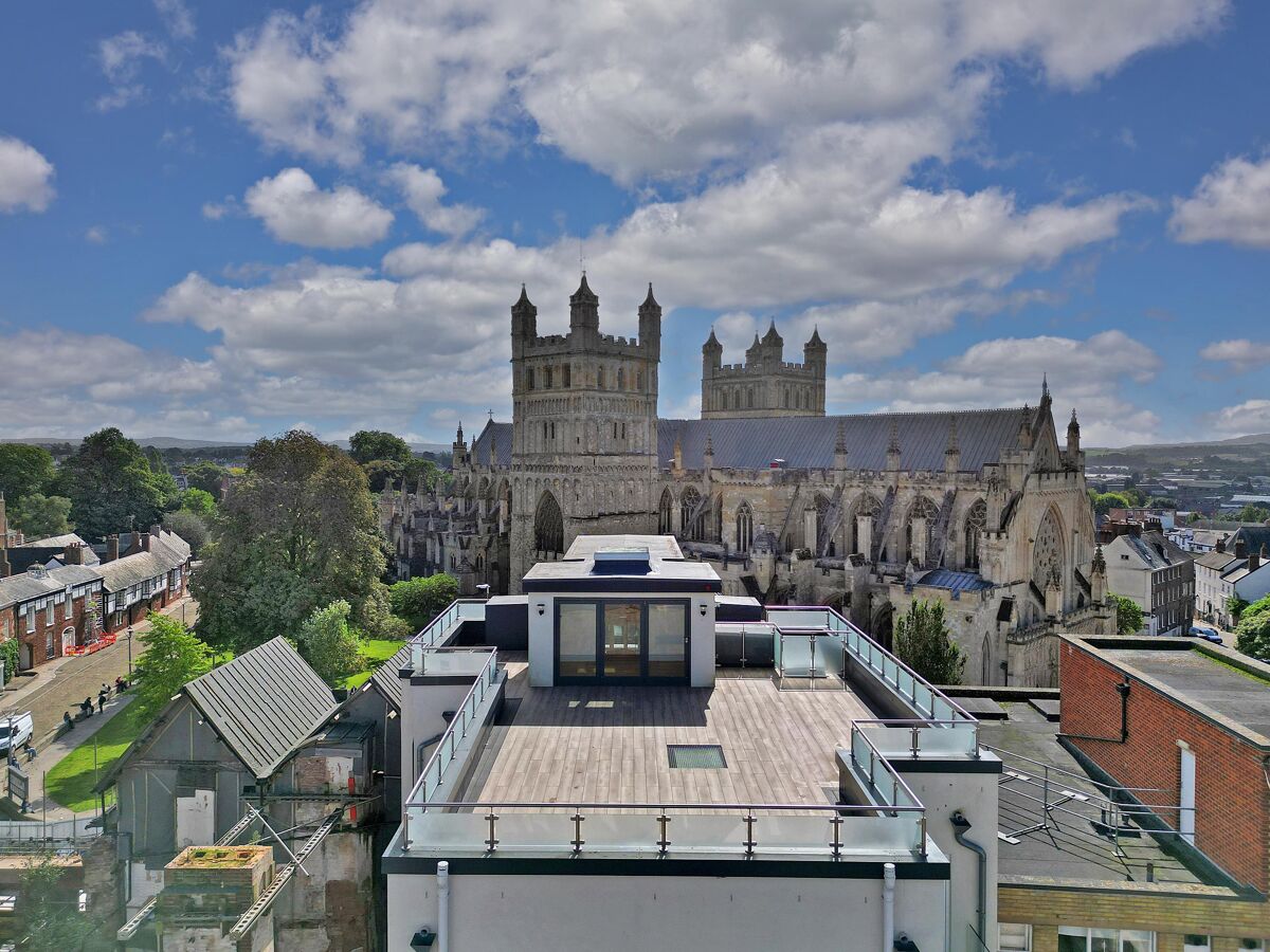A stunning two-bedroom apartment with a roof terrace and views of ...
