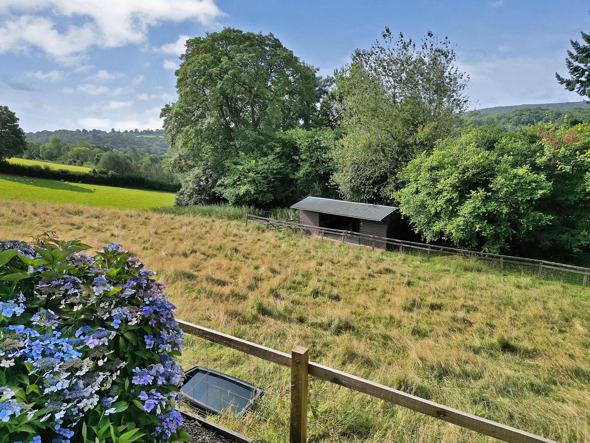 A comfortable detached family home with stables and extensive grounds ...