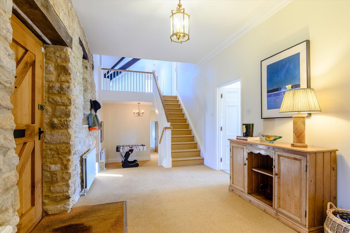 Tithe Barn is a converted medieval tithe barn in a private and charming ...