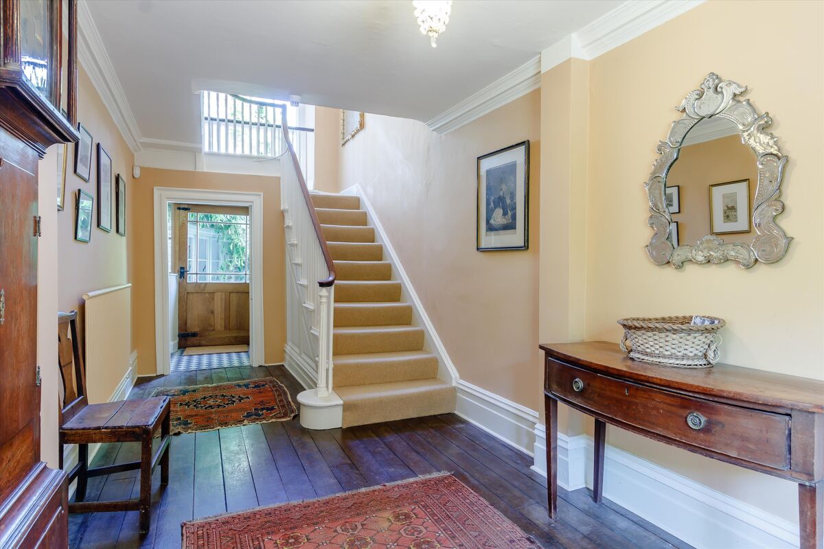 Keyham House is an unlisted Regency family house with a large walled ...