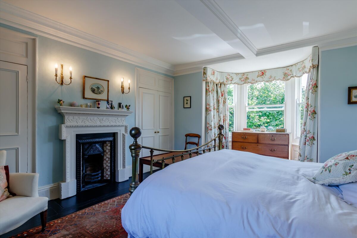 Keyham House is an unlisted Regency family house with a large walled ...