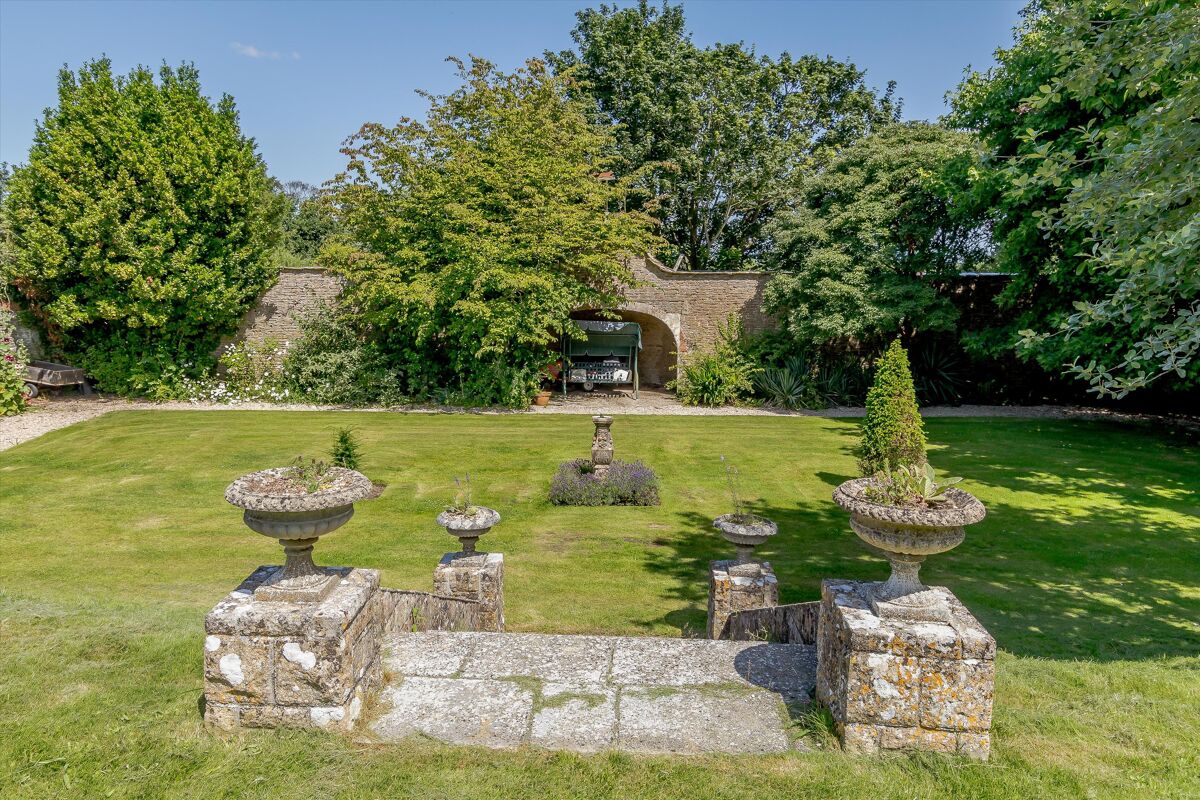 Keyham House is an unlisted Regency family house with a large walled ...