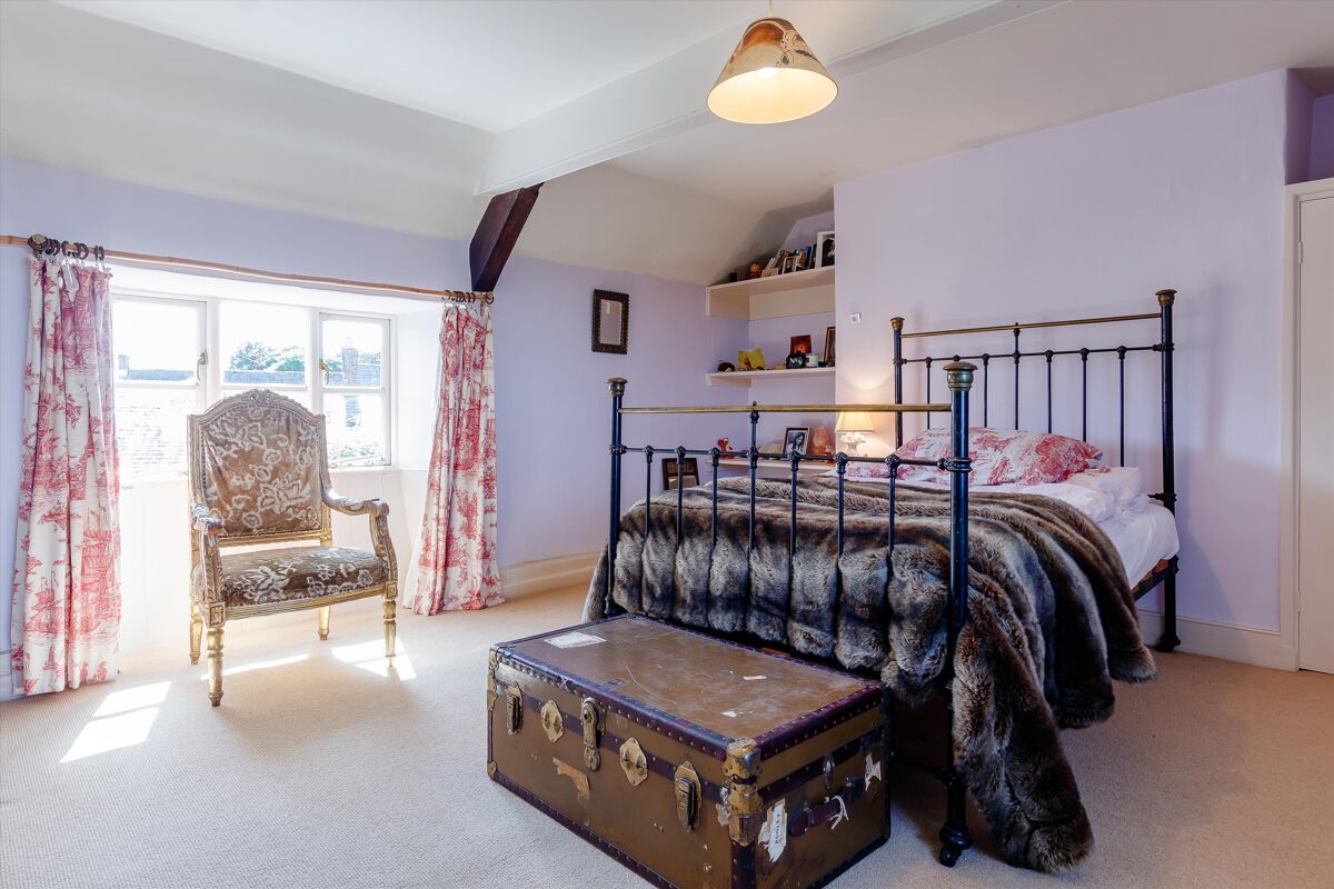 Keyham House is an unlisted Regency family house with a large walled ...