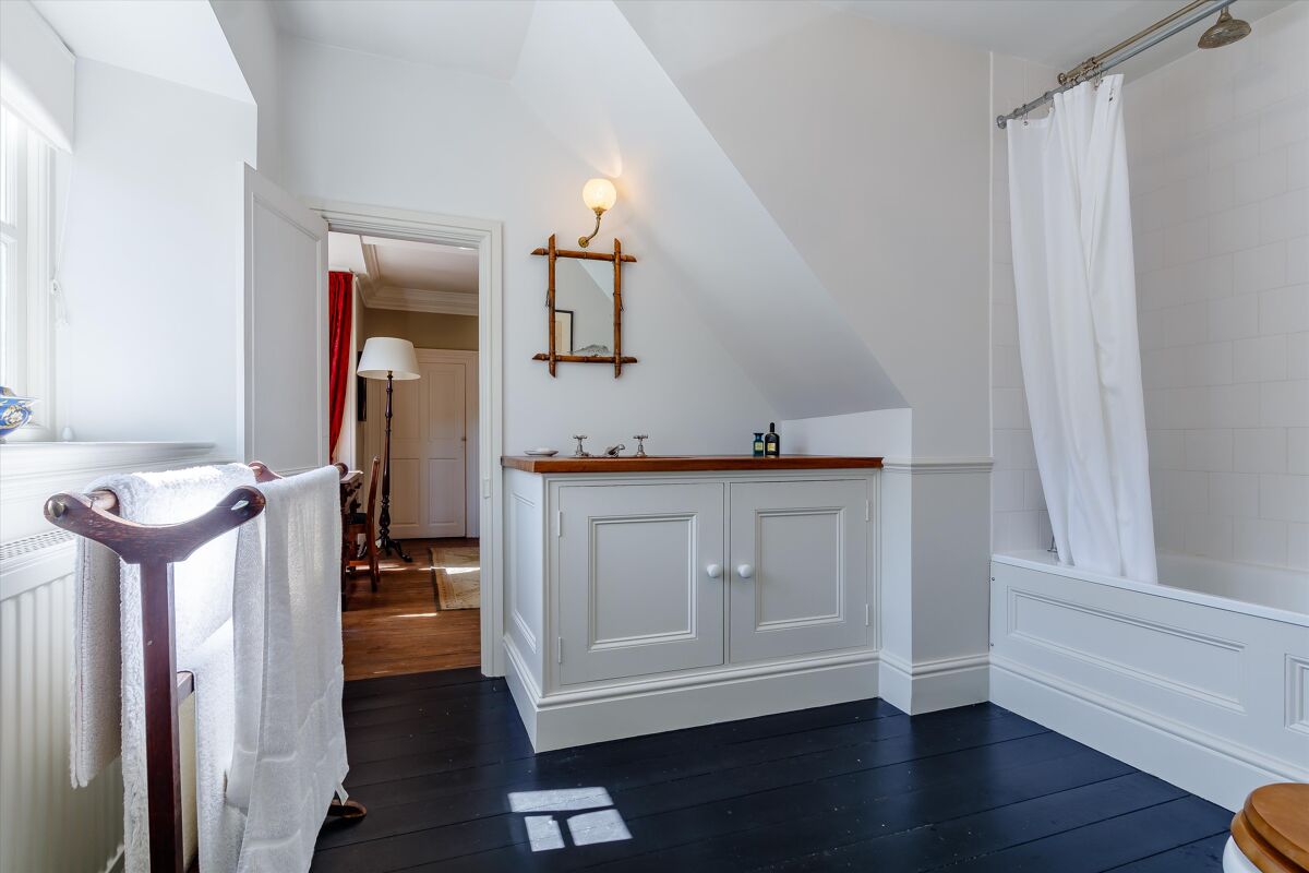 Keyham House is an unlisted Regency family house with a large walled ...