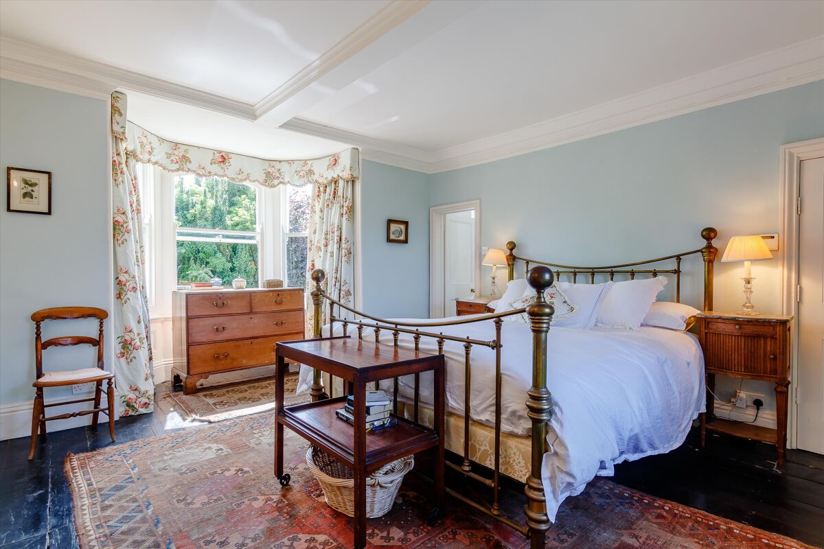 Keyham House is an unlisted Regency family house with a large walled ...